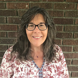 a headshot of Ellen Birkett Morris